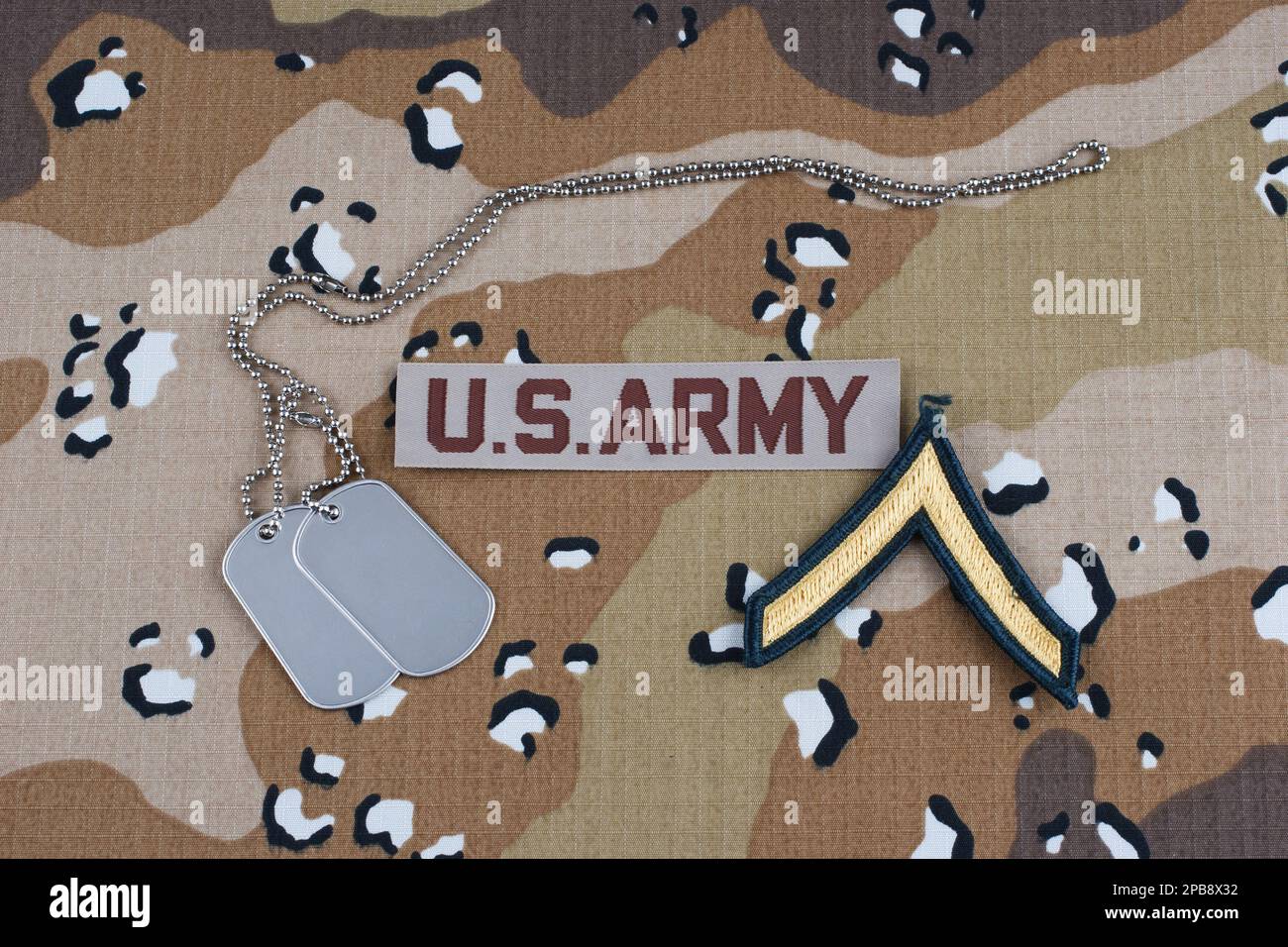 US ARMY private t rank patch and dog tags on Desert Battle Dress ...