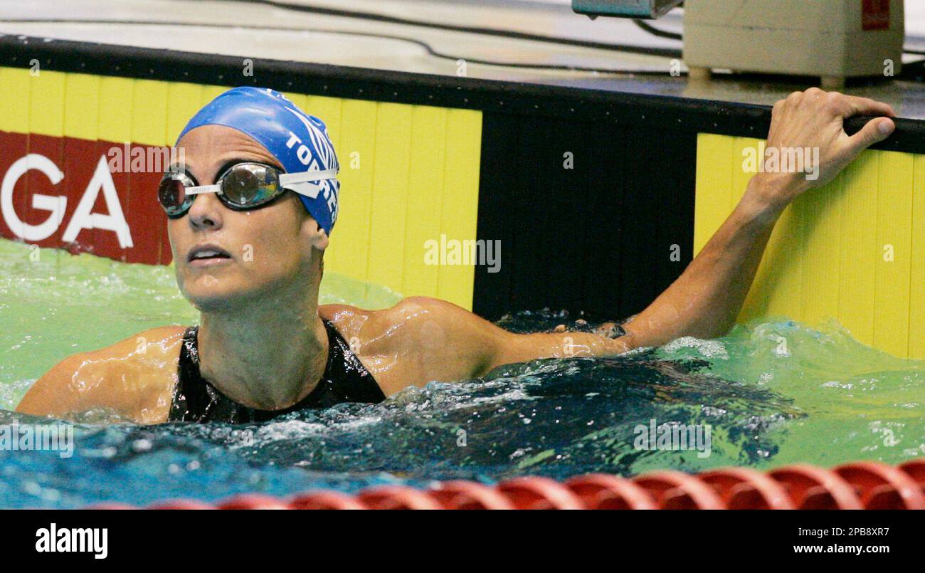 Swimmer Dara Torres looks at the scoreboard for her time in the ...