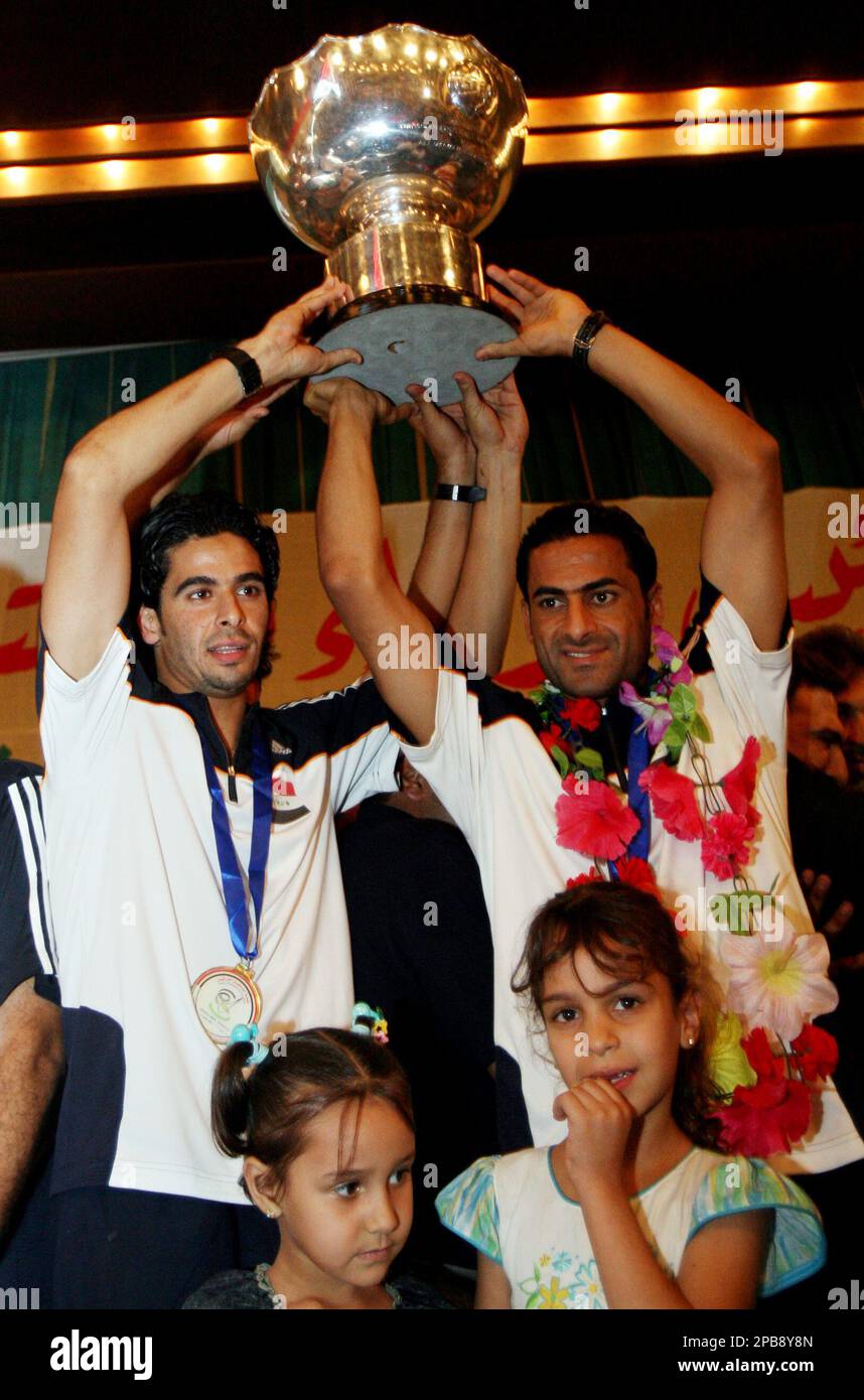 Nour Sabri, left, goalkeeper for the Iraqi national soccer team, and ...