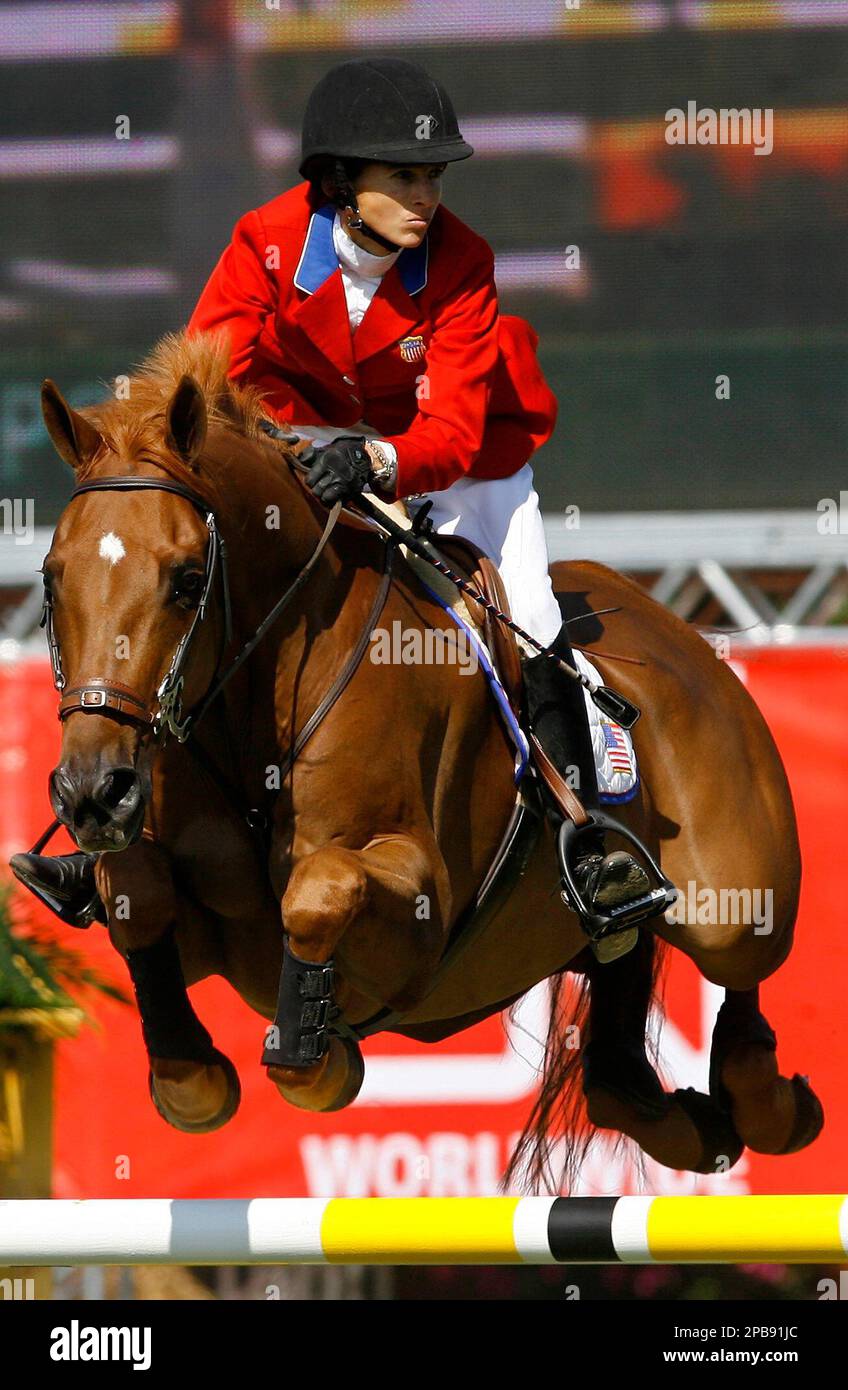 U.S. Laura Chapot riding 'Little Big man' clears an obstacle during the ...