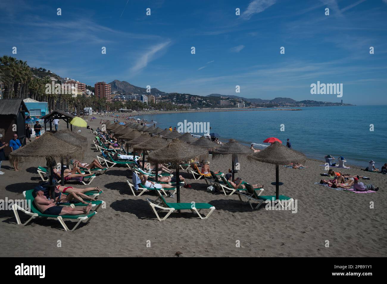 Malaga, Spain. 12th Mar, 2023. Bathers are seen at Malagueta beach ...