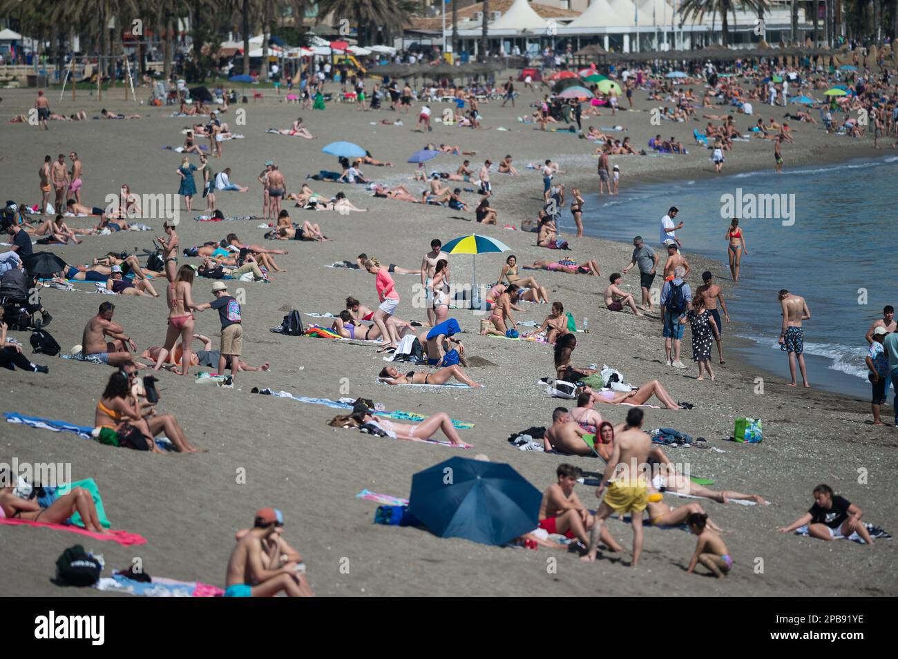 Malaga, Spain. 12th Mar, 2023. Bathers are seen at Malagueta beach ...