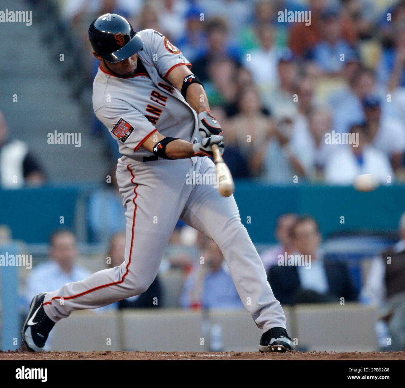 San Francisco Giants' Randy Winn singles to score Jose Feliz during the ...