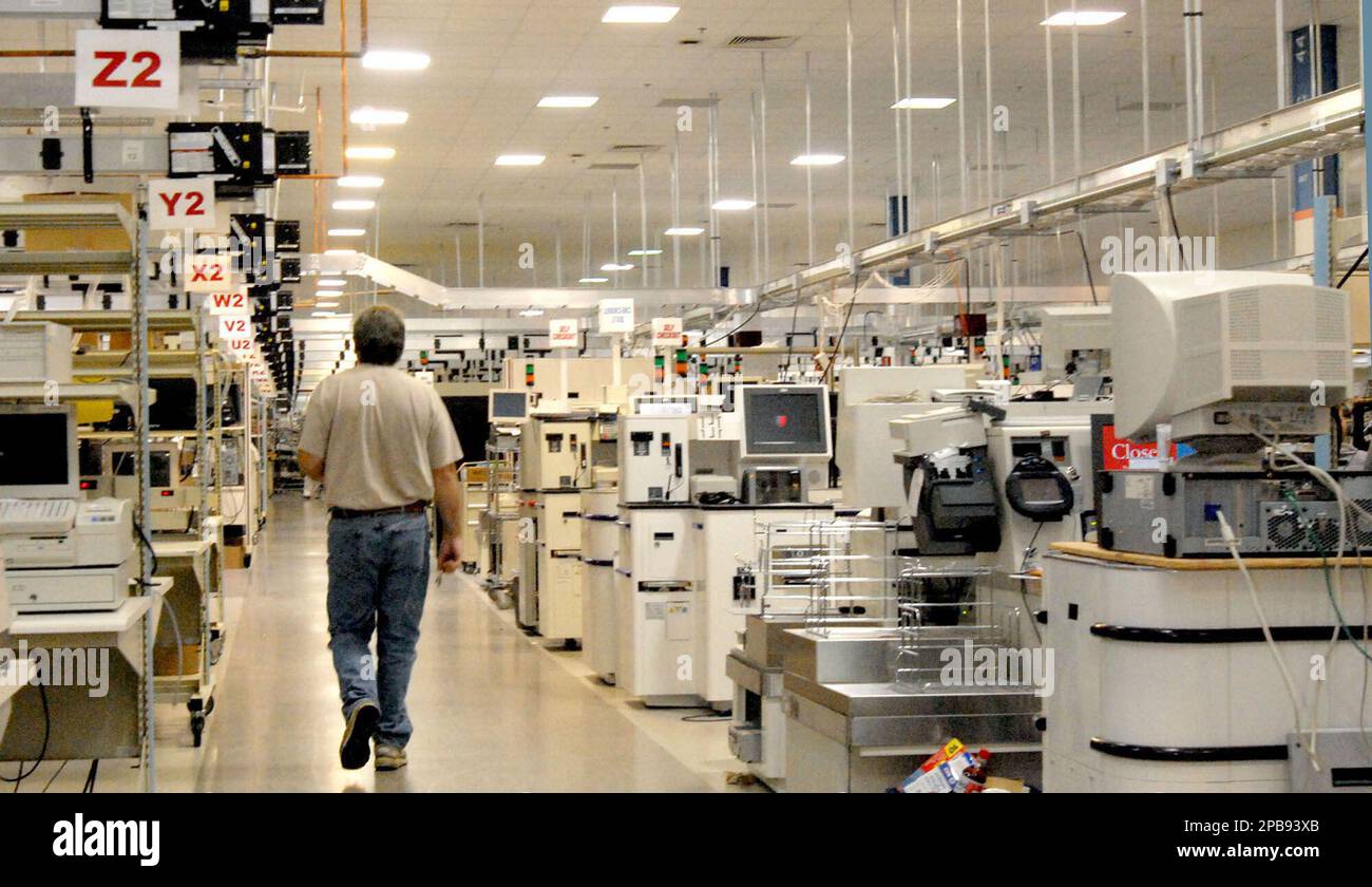 An IBM employee walks through the Retail Test Super Lab where testing ...
