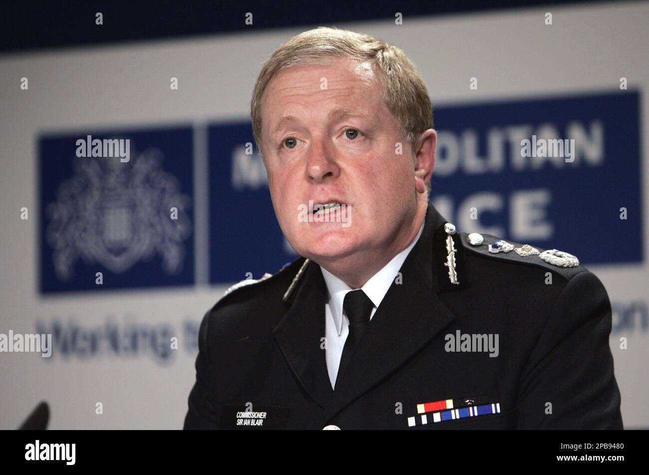 Metropolitan Police Commissioner Ian Blair reads a statement to the ...