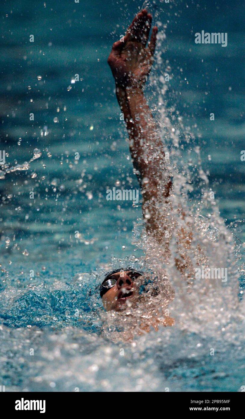 Michael Phelps swims to a win in the men's 200-meter backstroke at the ...