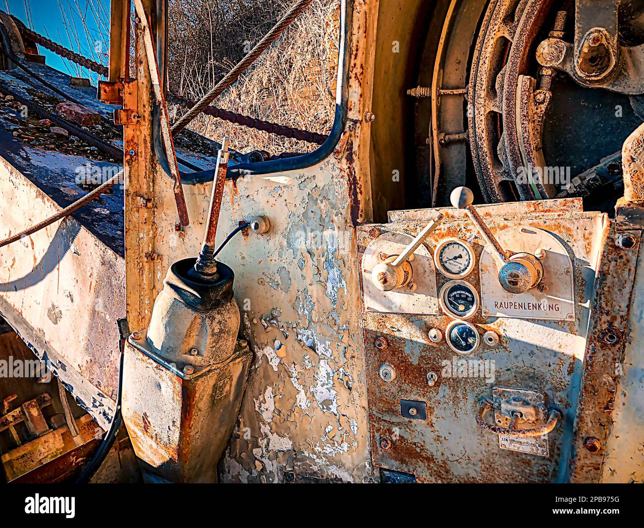 Driver's cab of an old, decayed excavator from an earlier time. A lost ...