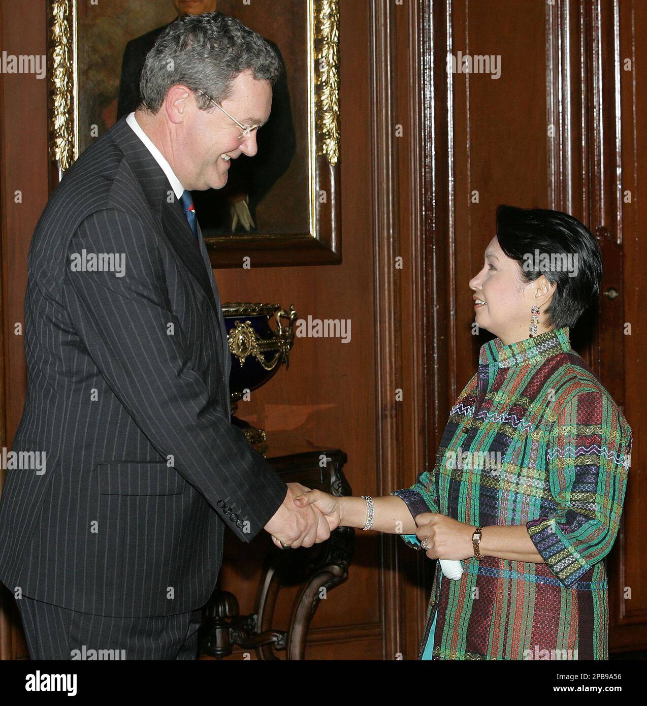 Philippine President Gloria Macapagal Arroyo, right, greets Australian ...