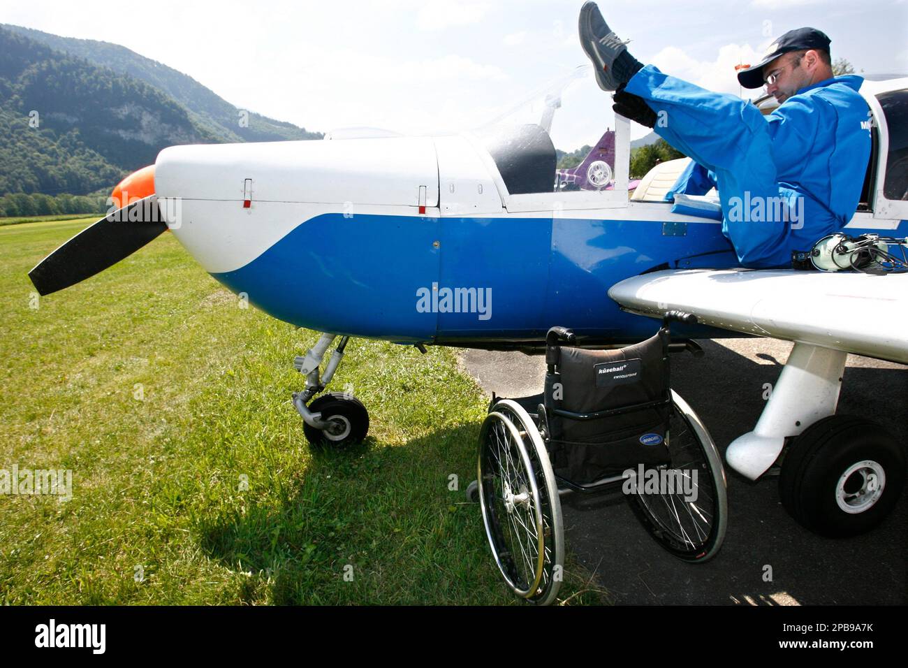 French handicaped pilot Philippe Carette gets in his plane, prior the ...