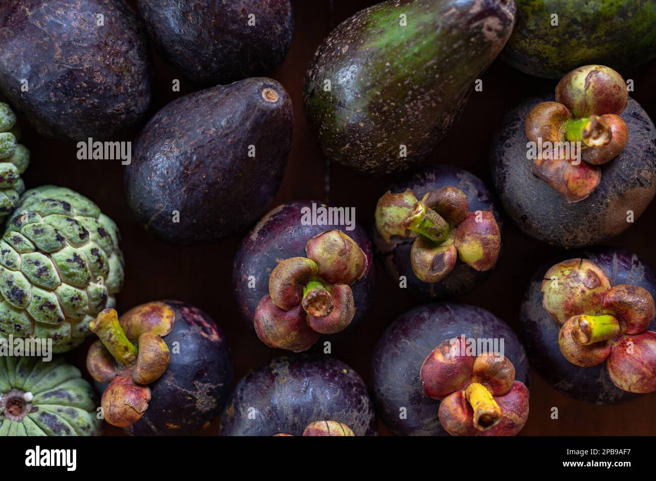 Set of Balinese fruits and vegetables. Banana, dragon fruit, mango ...