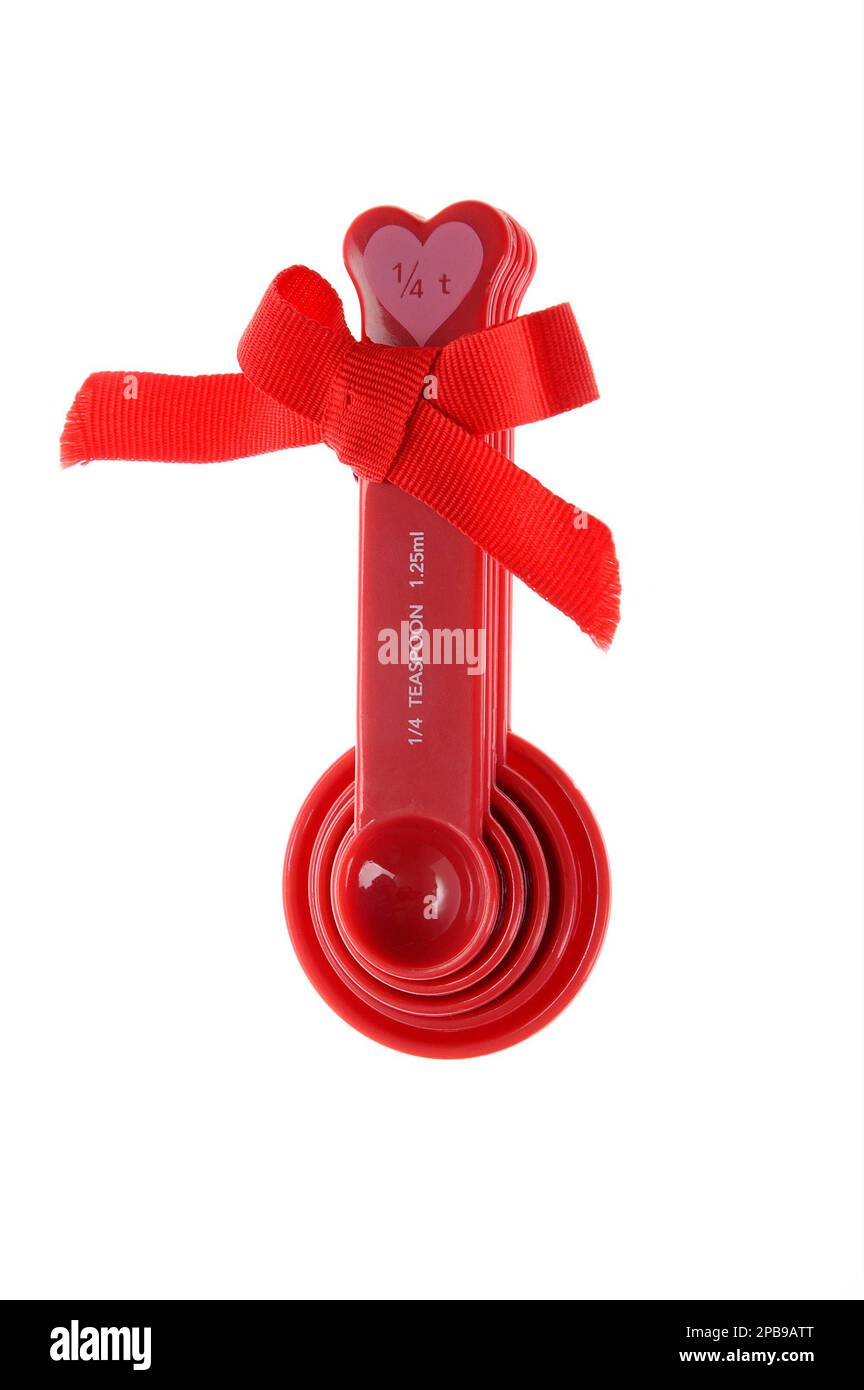 Measuring spoons, cooking utensils and kitchen items, red with pink ...