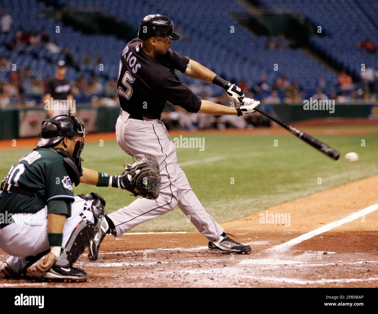 Toronto Blue Jays' Alex Rios doubles in the fourth inning of a baseball ...