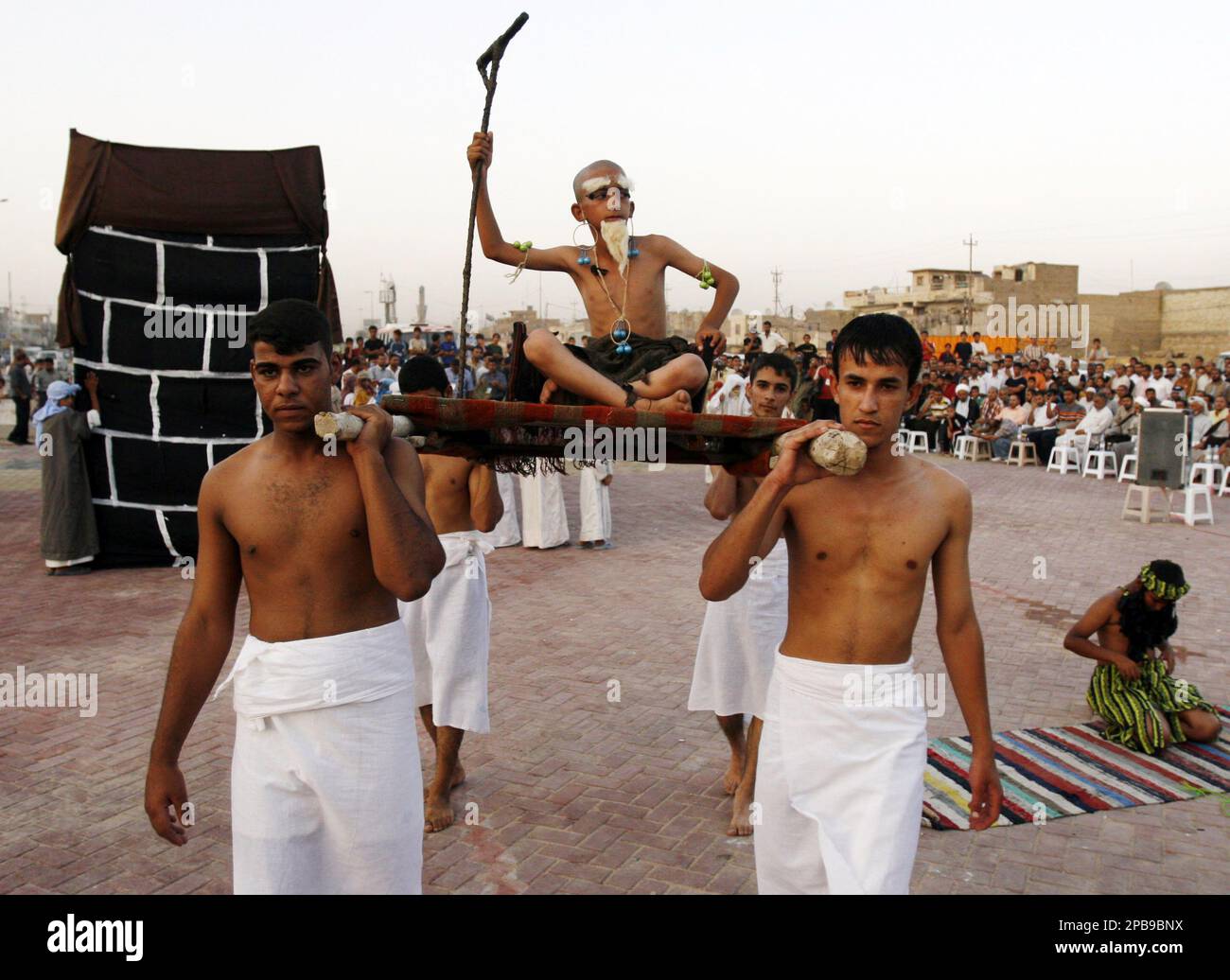Children perform in a play during a ceremony marking the birthday of ...