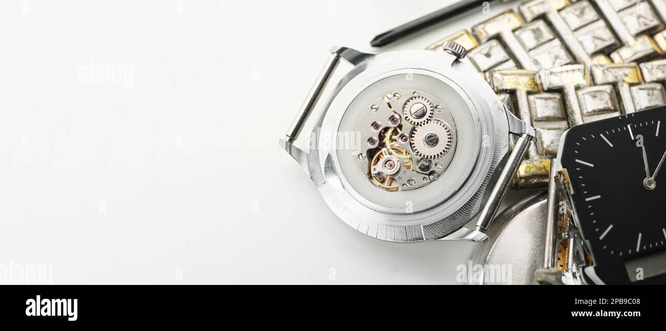 Broken mechanical watches background hi-res stock photography and ...