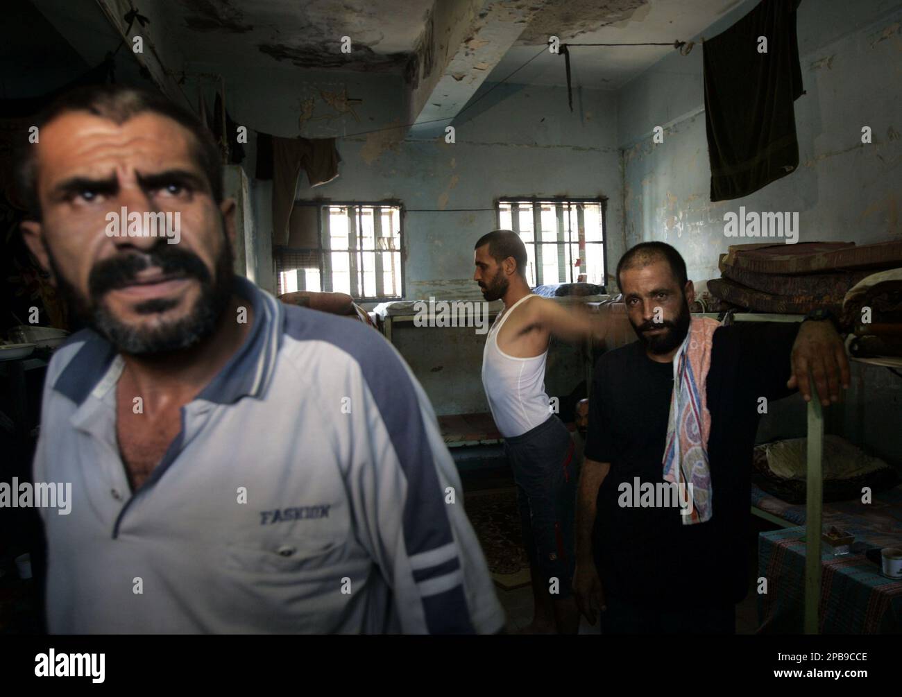 Palestinian prisoners stand in a cell in the Hamas-controlled Saraya ...