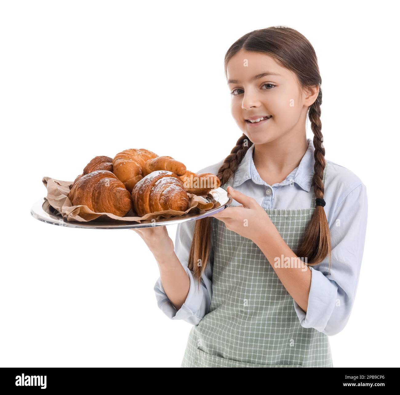 Little baker with tray of tasty croissants on white background Stock ...