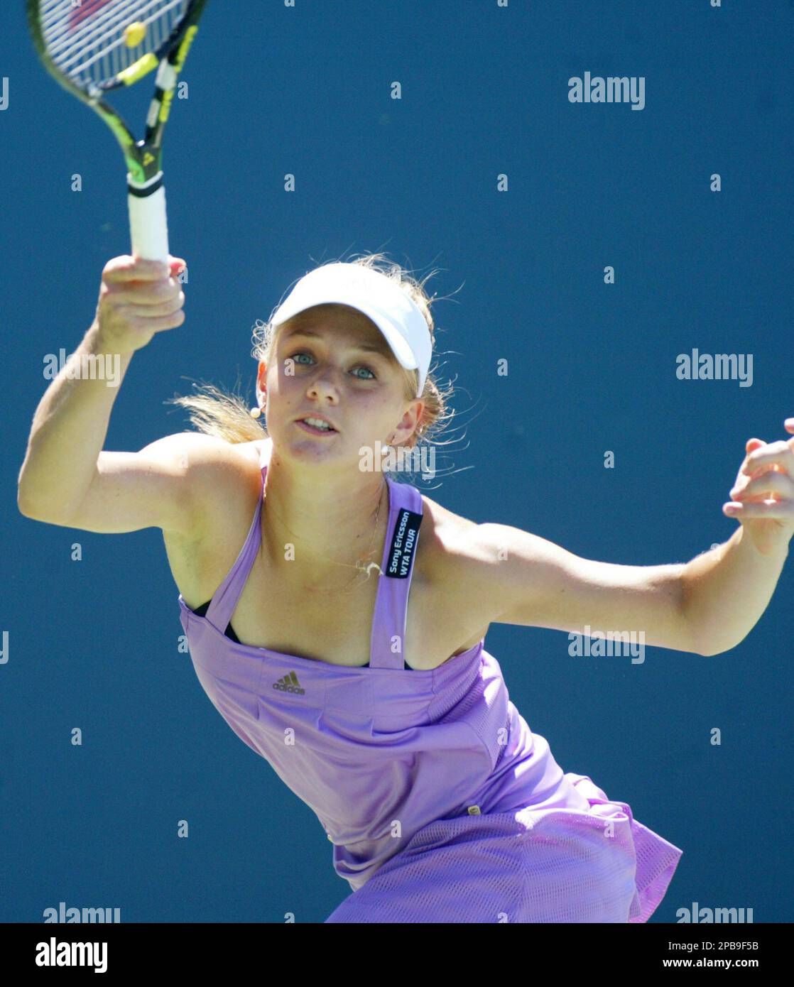 Anna Chakvetadze of Russia hits forehand a against Sania Mirza of India ...