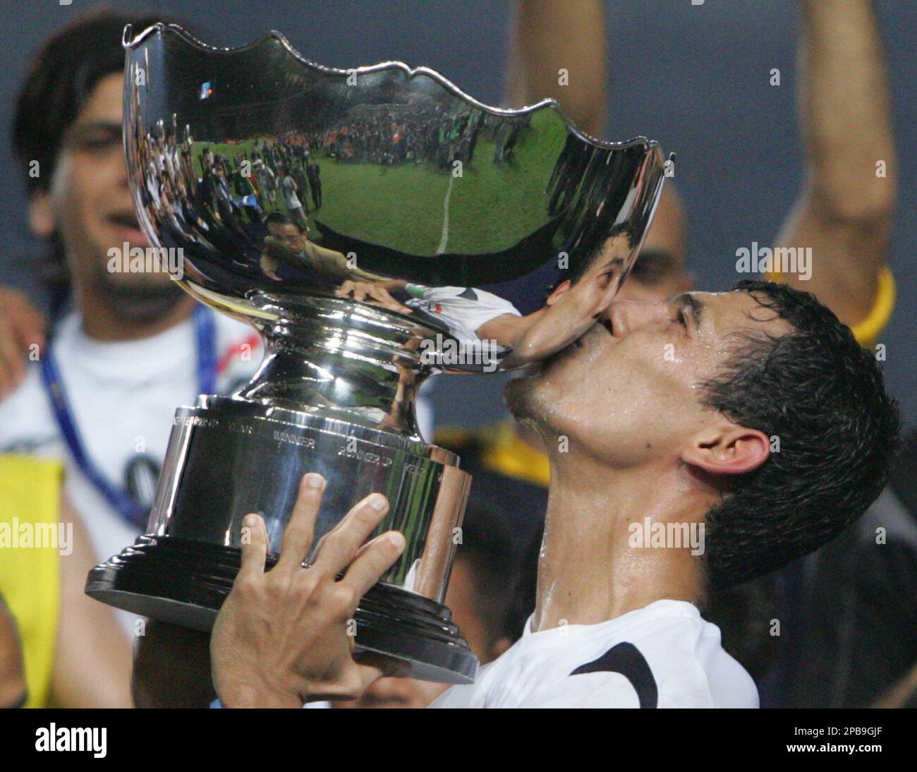 Iraq's Younis Khalef kisses the trophy after winning Asia Cup soccer ...