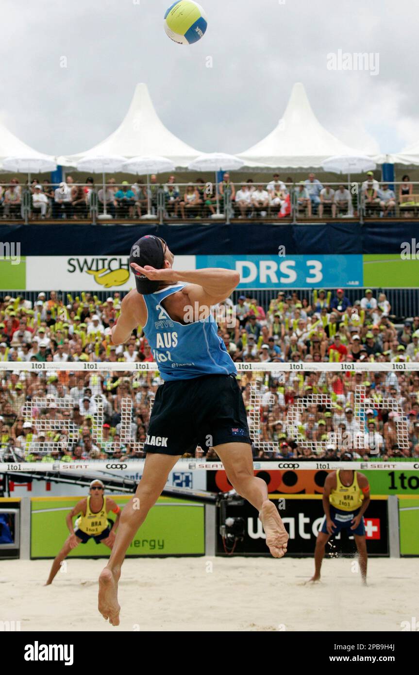 Australia's Josh Slack serves during the match for the bronze medal ...