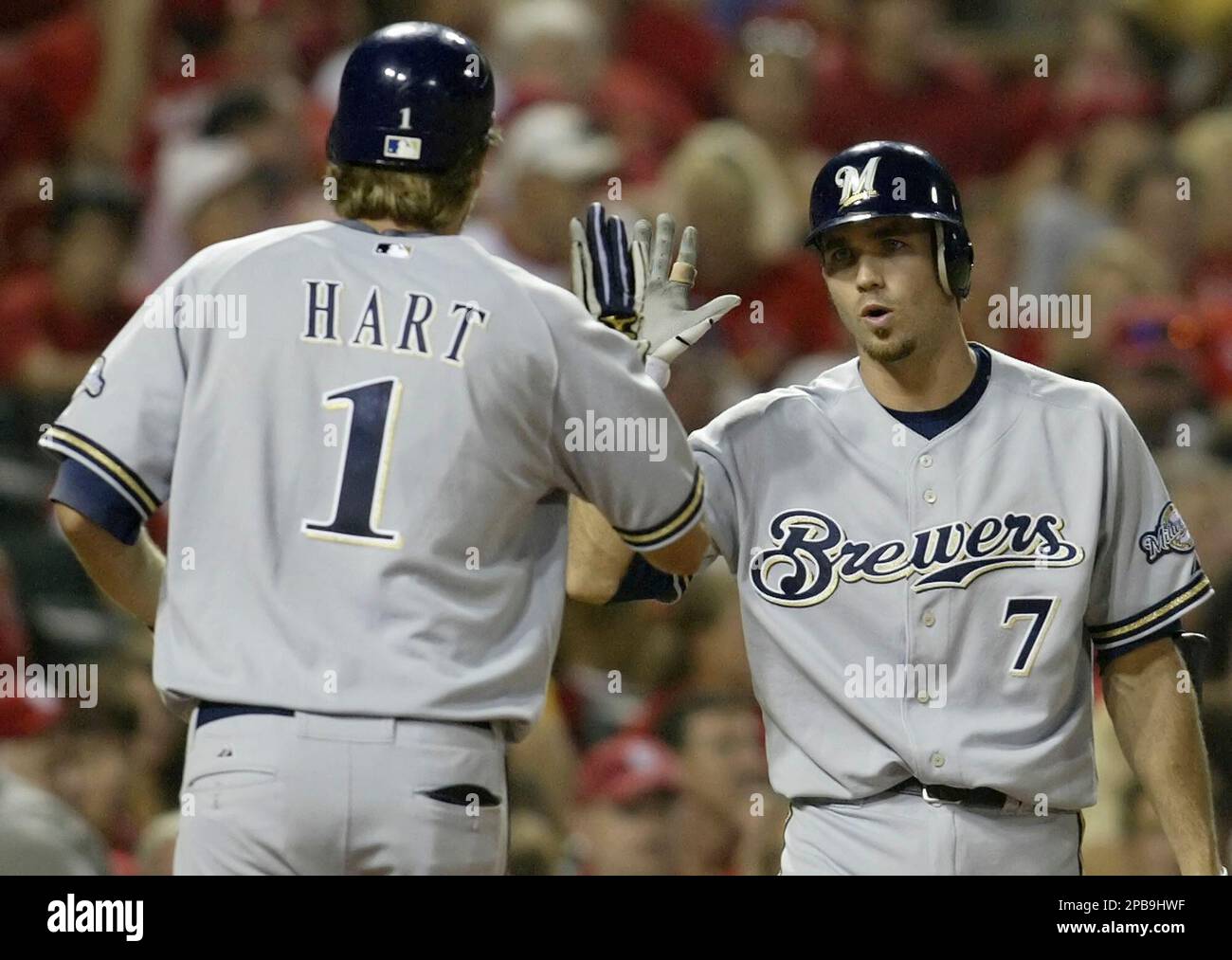 Milwaukee Brewers' Corey Hart celebrates with teammate J.J. Hardy (7 ...
