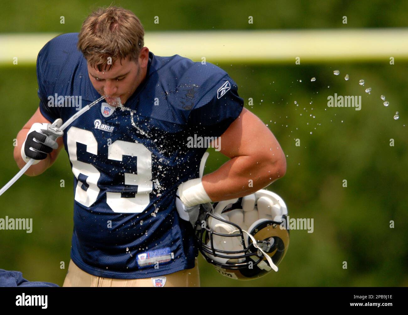 St. Louis Rams defensive end Ryan Willis takes a drink of water during ...