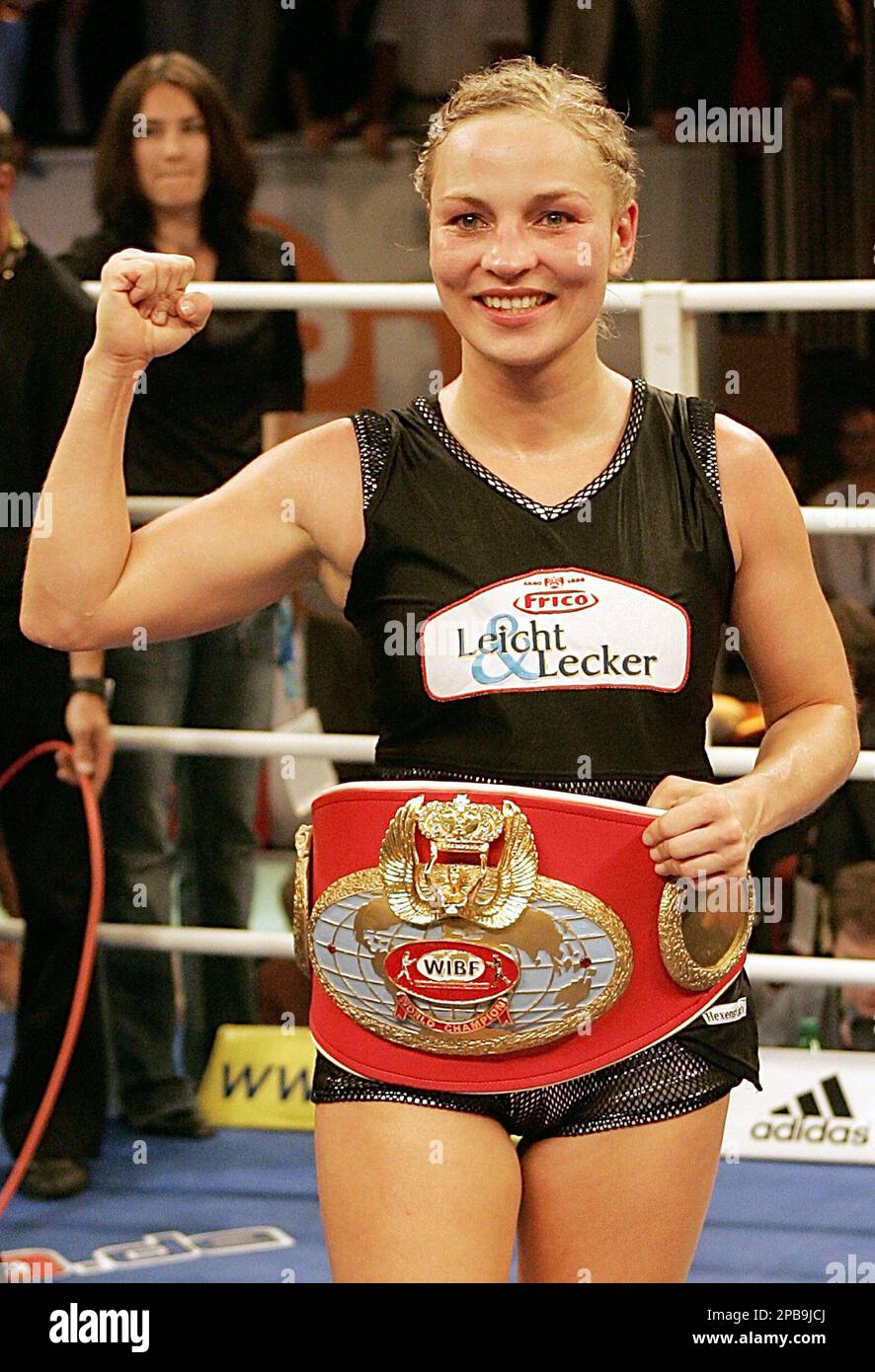 Germany's Regina Halmich celebrates after winning WIBF World Flyweight ...