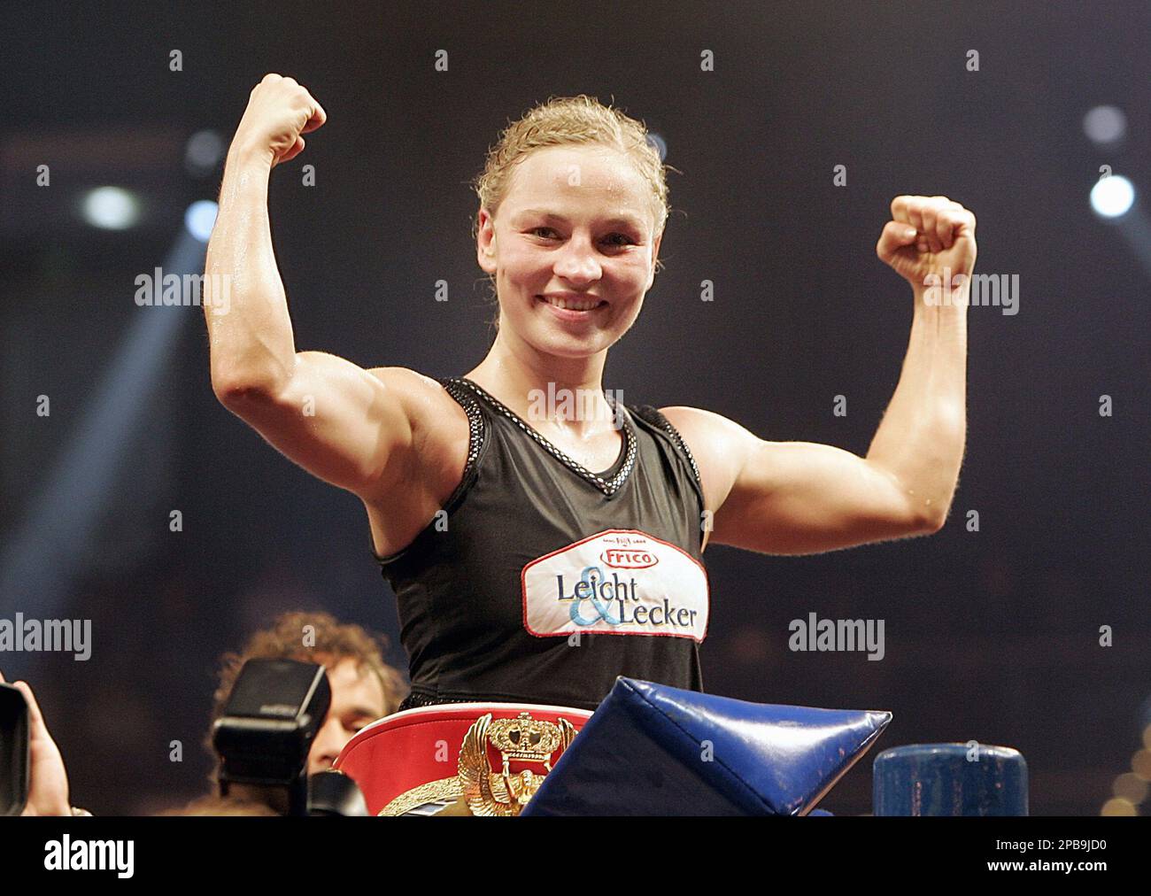 Germany's Regina Halmich celebrates after winning WIBF World Flyweight ...
