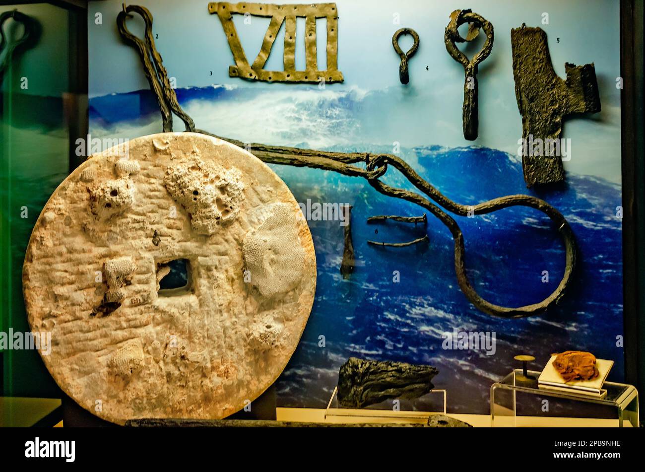 Artifacts from the slave ship Henrietta Marie circa 1700 are displayed ...