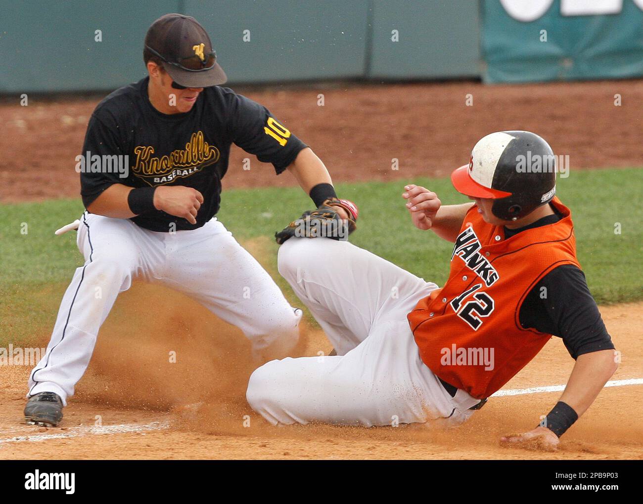 Manchester West Delaware's BJ Hermsen slides safely into third past the ...