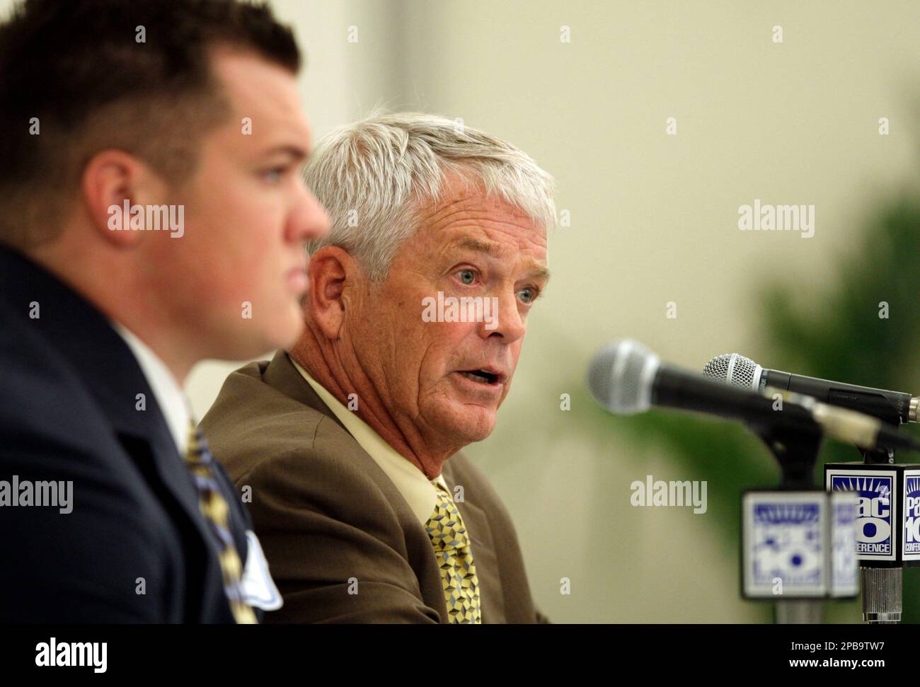 Dennis Erickson, right, new coach of Arizona State speaks as center ...