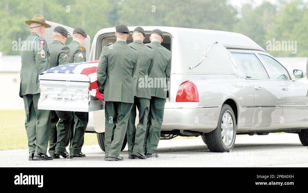 The casket of Pfc. James J. Harrelson, 19, of Dadeville, Ala., is ...