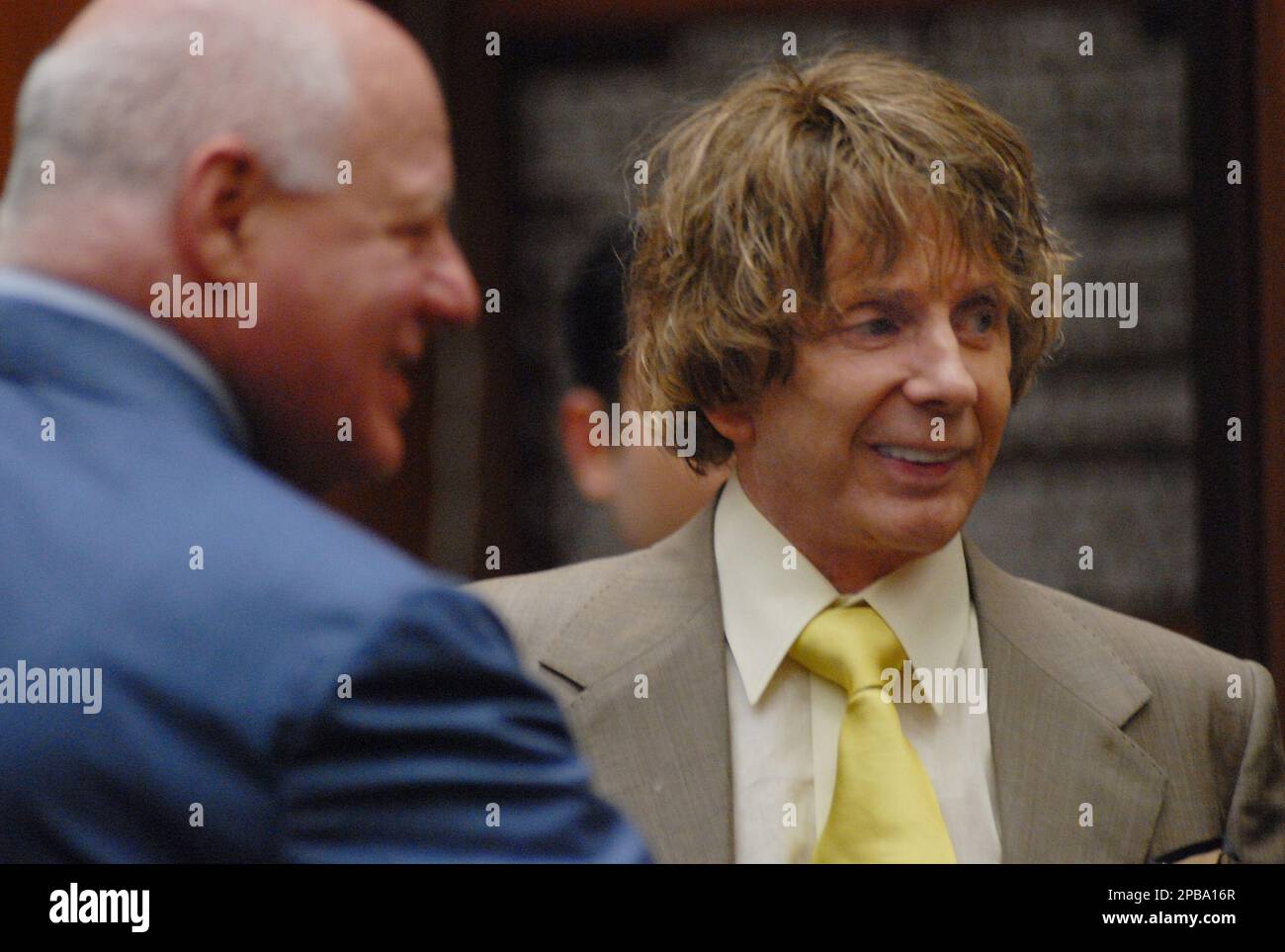 Music producer Phil Spector, right, is shown with his defense attorney ...