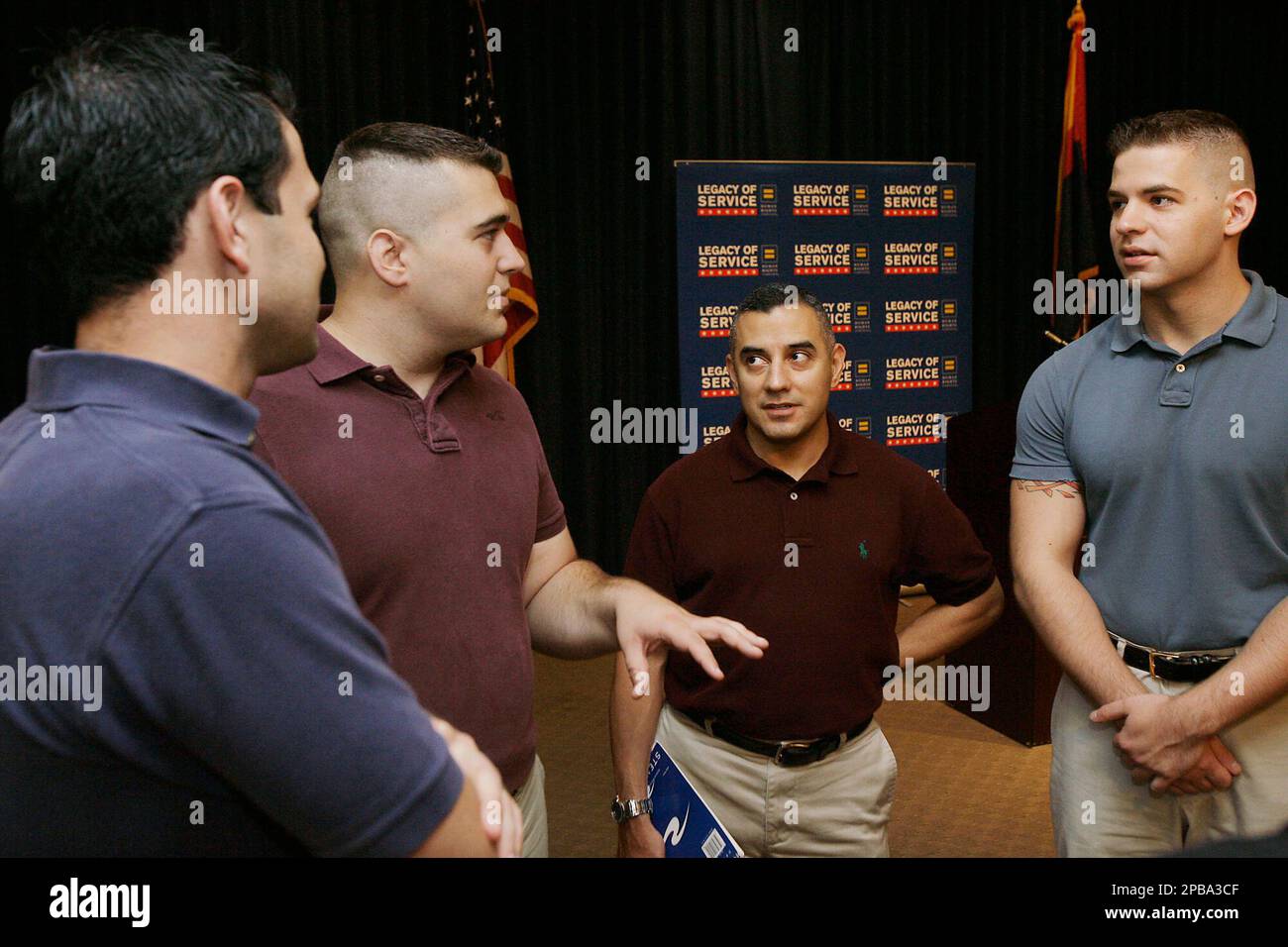 Former servicemen, from left, Marine Corps 1st Lt. Antonio Agnone, Army ...