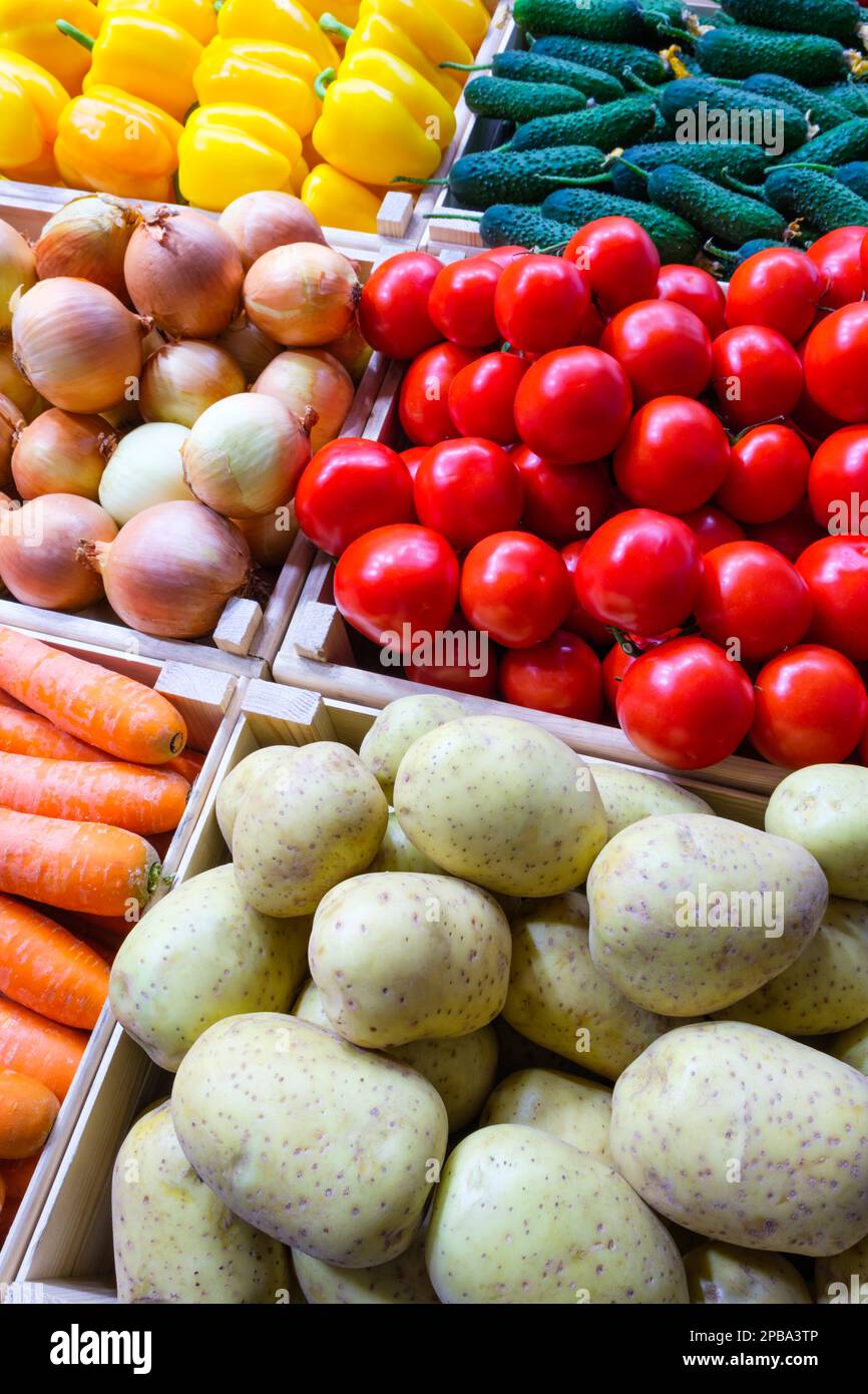 big choice of fresh fruits and vegetables on market counter Stock Photo ...