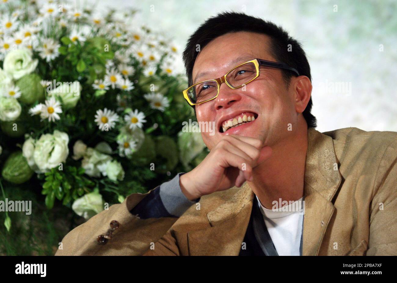 ** FILE ** Hong Kong film director Andrew Lau smiles as he answers ...
