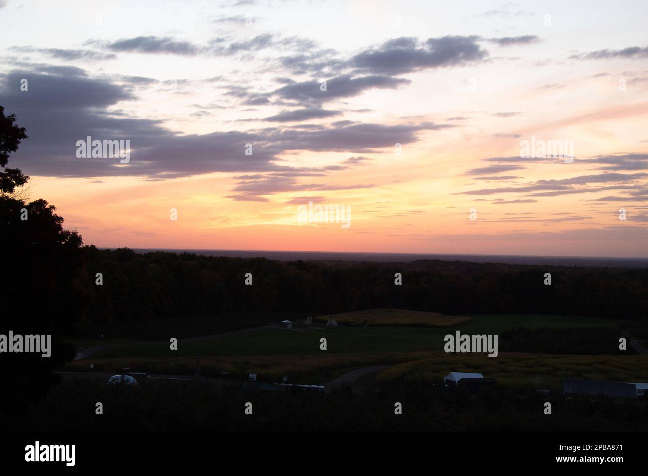 Sunset over the valley Stock Photo - Alamy