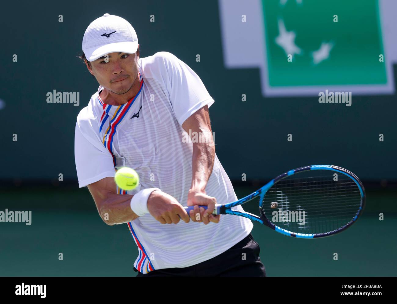 March 12, 2023 Taro Daniel of Japan returns a shot against Cameron ...