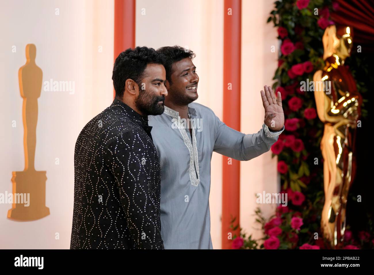 Kaala Bhairava, left, and Rahul Sipligunj arrive at the Oscars on Sunday, March 12, 2023, at the ...
