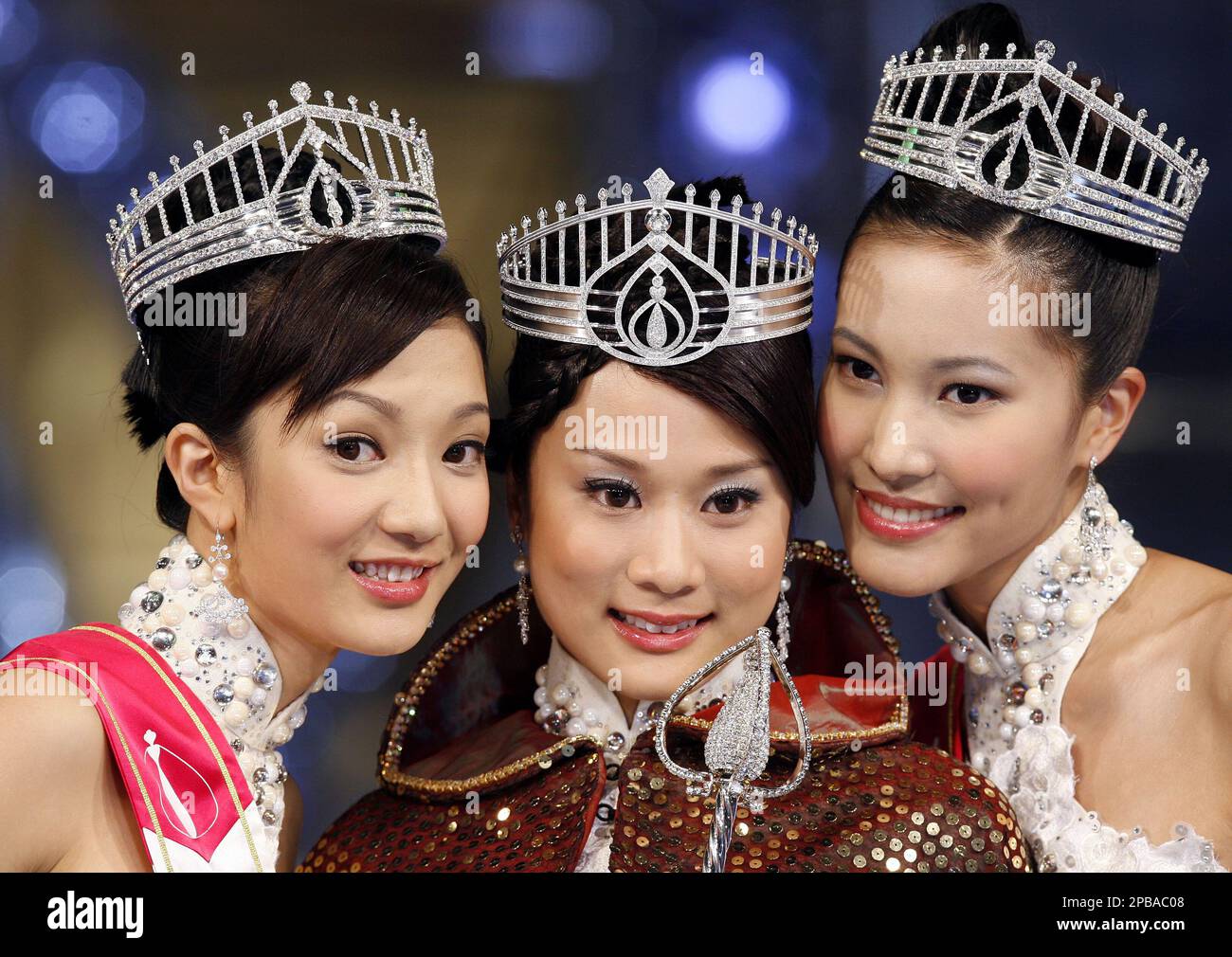 Kayi Cheung, center, a 23-year-old student is crowned Miss Hong Kong ...