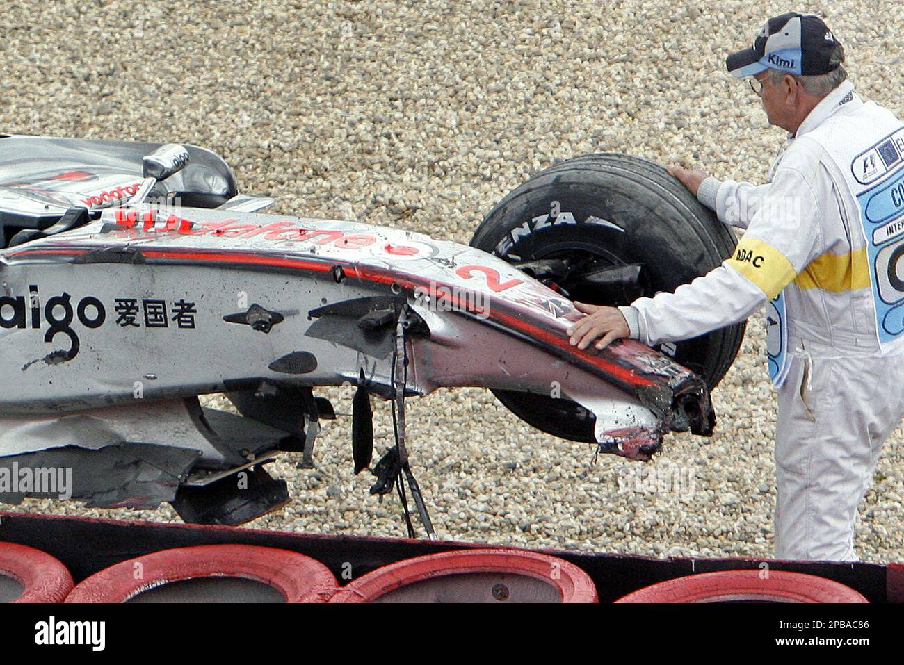The damaged car of British McLaren Mercedes Formula One driver Lewis ...