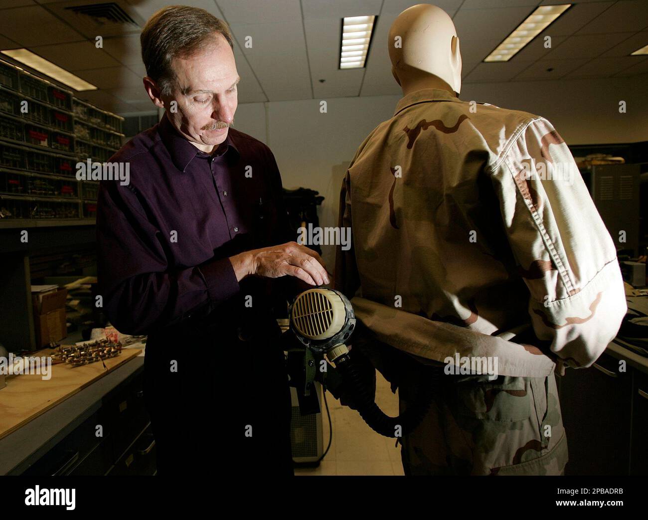 Chemical engineer Walter Teal shows a Body Ventilation system at U.S ...