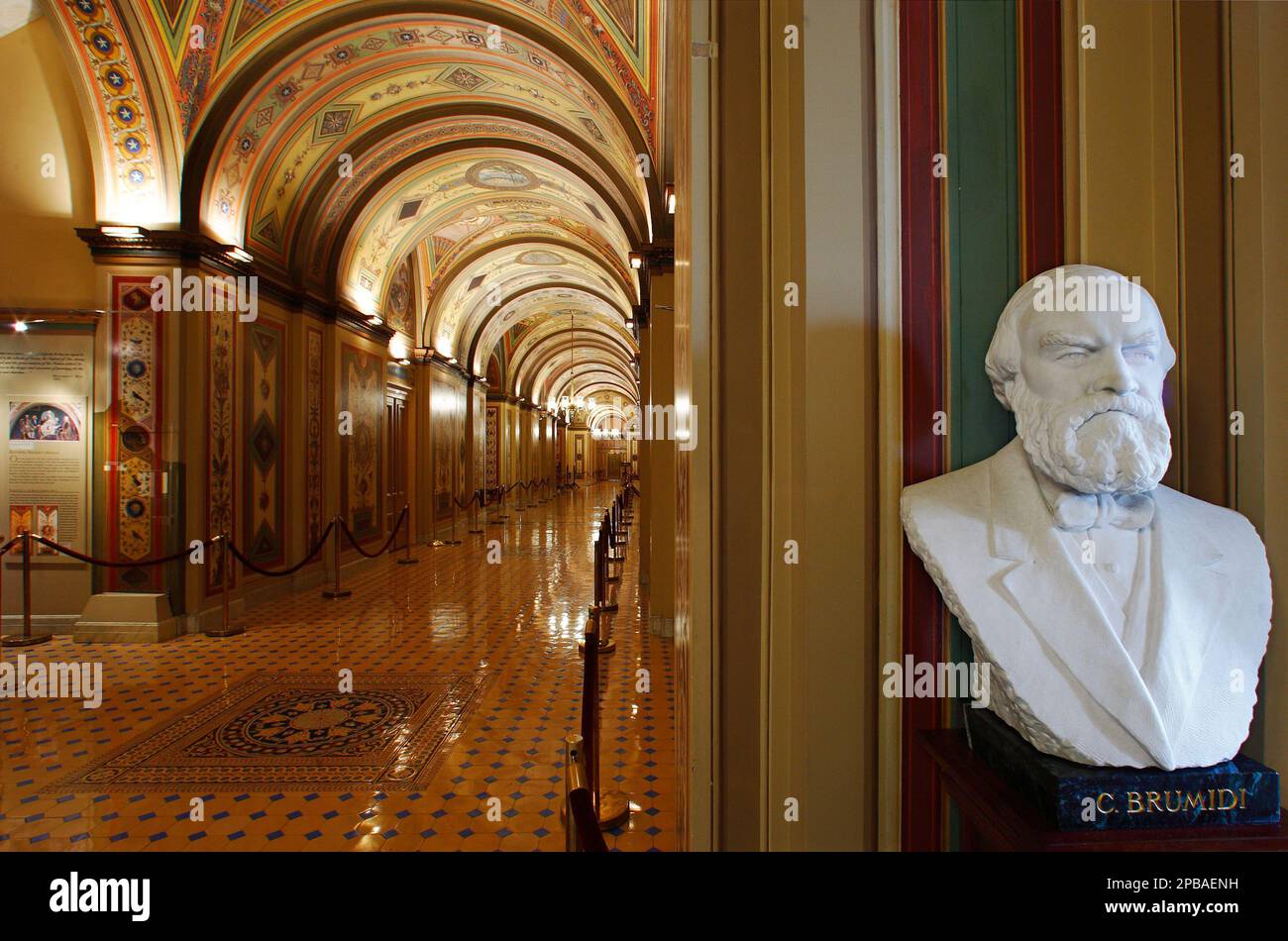 A bust of Constantino Brumidi is seen next to the corridors he frescoed ...