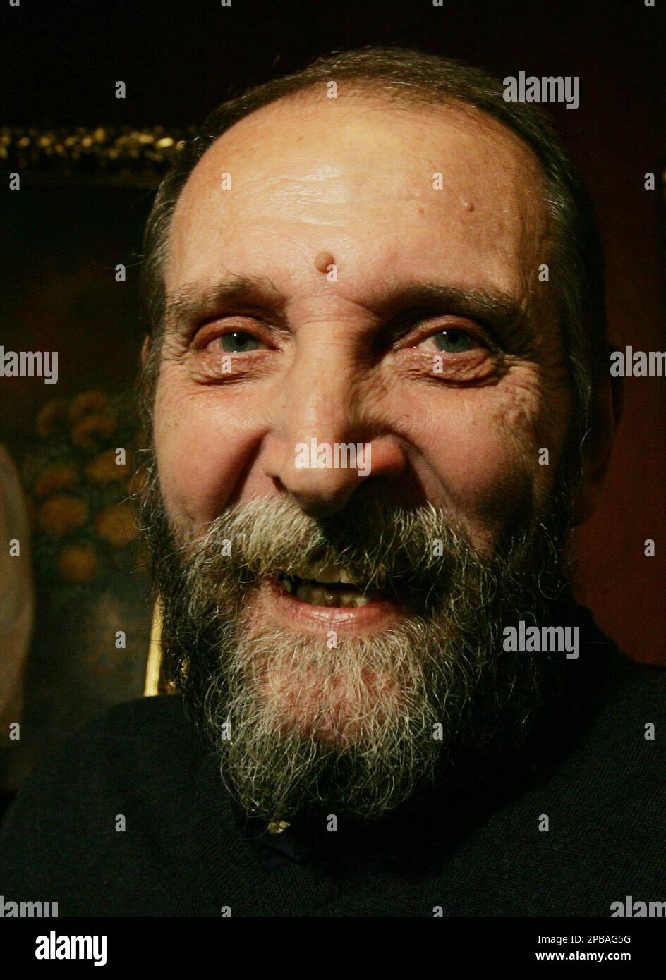 Released Italian missionary priest Giancarlo Bossi smiles as he is ...