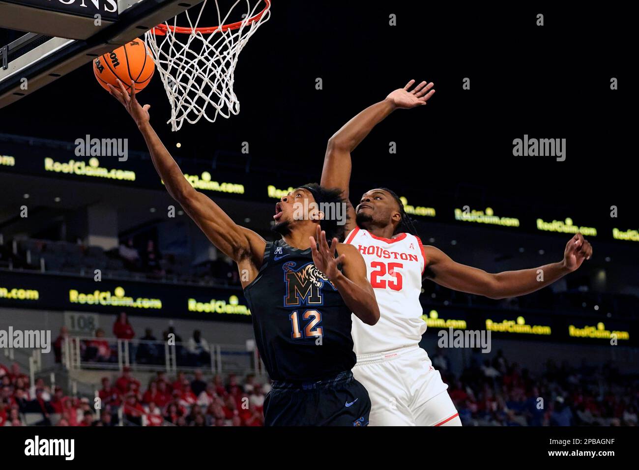 Memphis forward DeAndre Williams (12) scores against Houston forward ...
