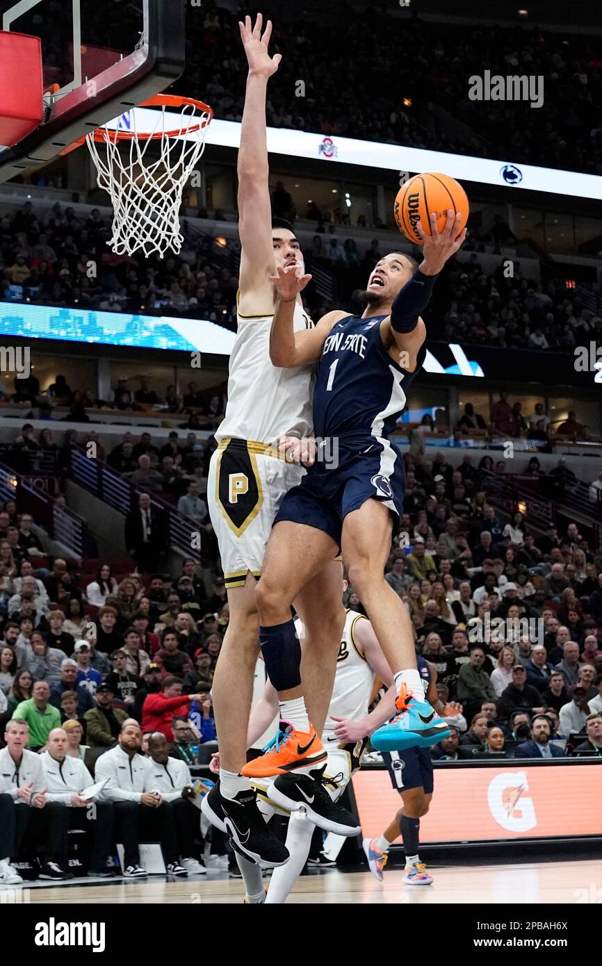 Penn State's Seth Lundy drives to the basket as Purdue's Zach Edey ...