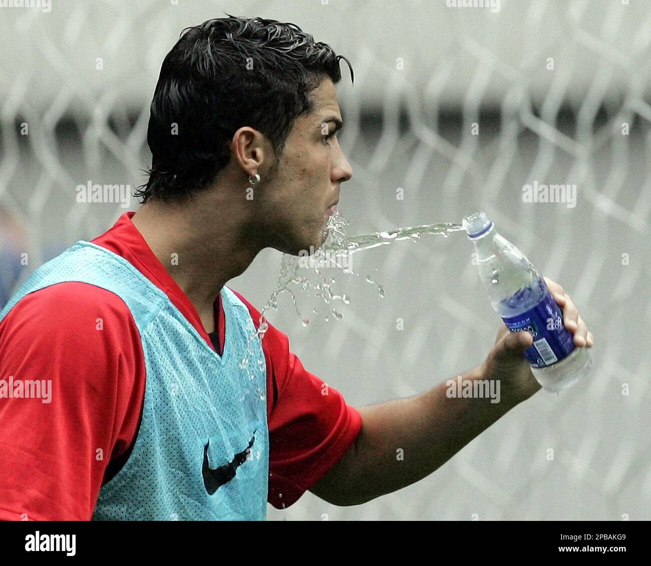 England's Manchester United Portuguese striker Cristiano Ronaldo drinks ...