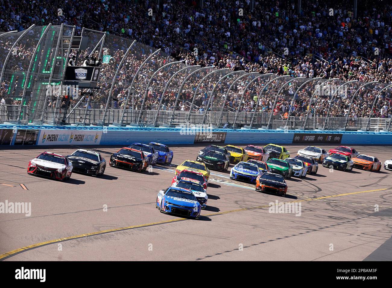 Cars take the starting flag during the NASCAR Cup Series auto race at ...