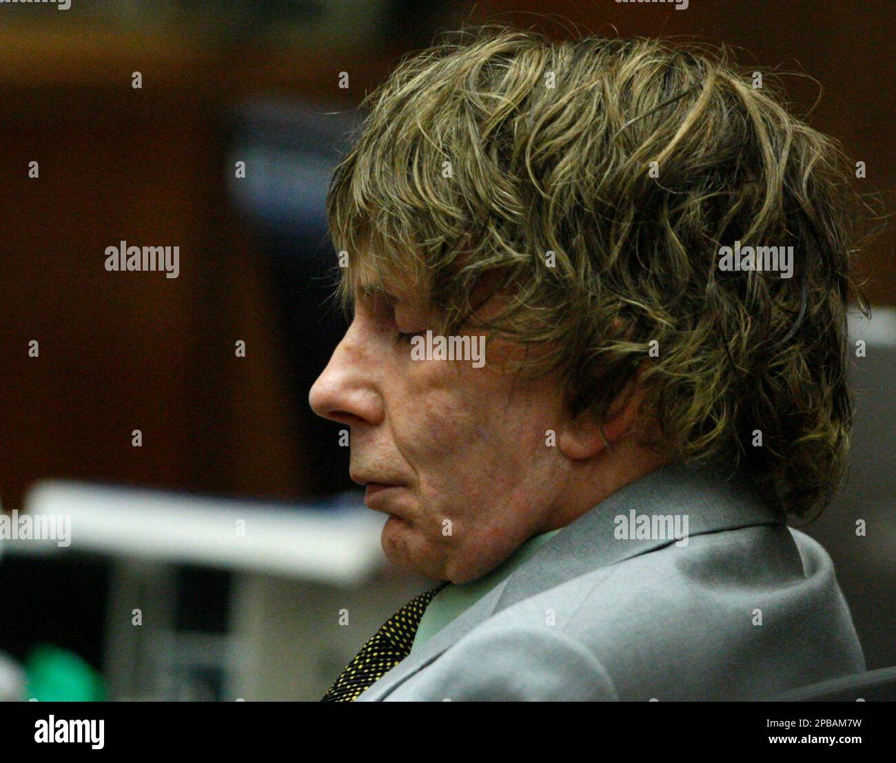 Music producer Phil Spector closes his eyes during his murder trial at ...