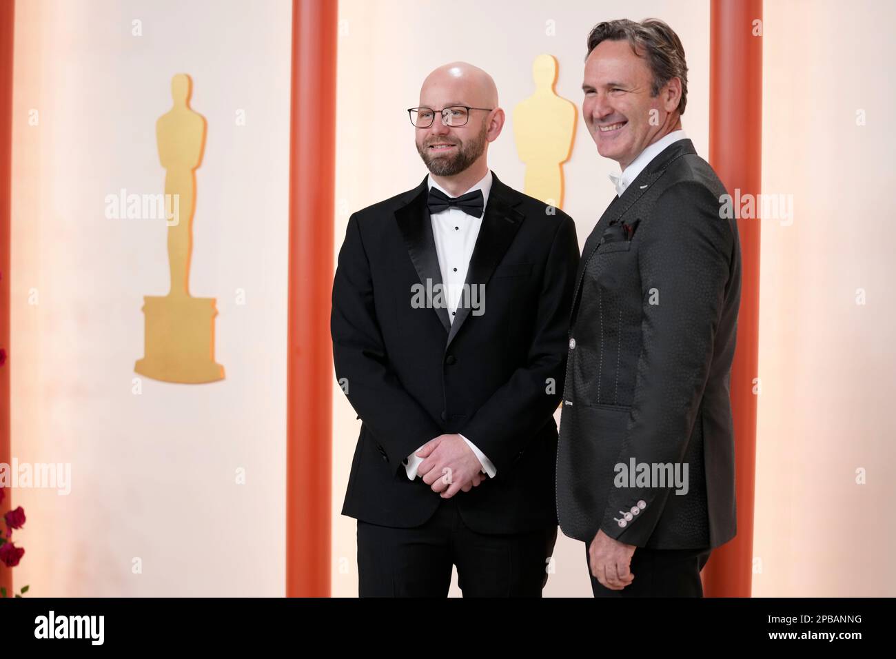 Seth Hill, left, and Scott R. Fisher arrive at the Oscars on Sunday ...