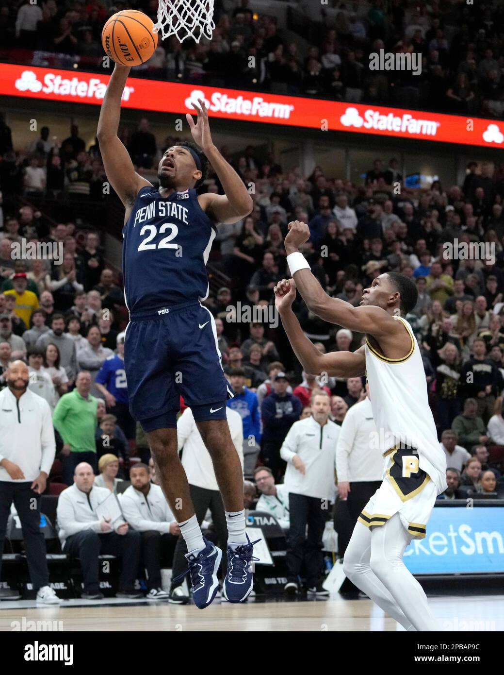 Penn State's Jalen Pickett (22) scores past Purdue's Brandon Newman ...